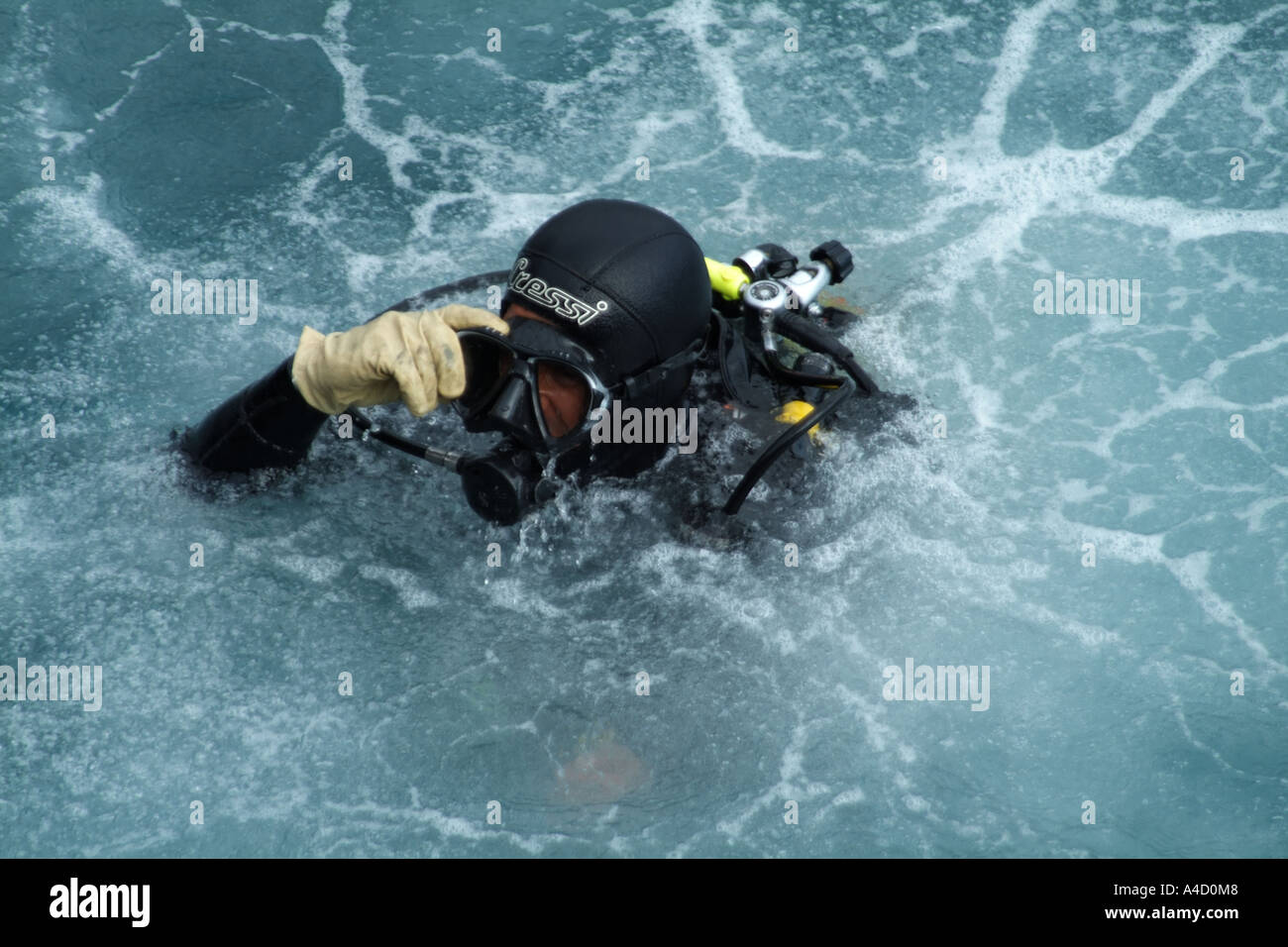 Professional diver preparing to dive Atlantic Ocean off Tenerife canary ...