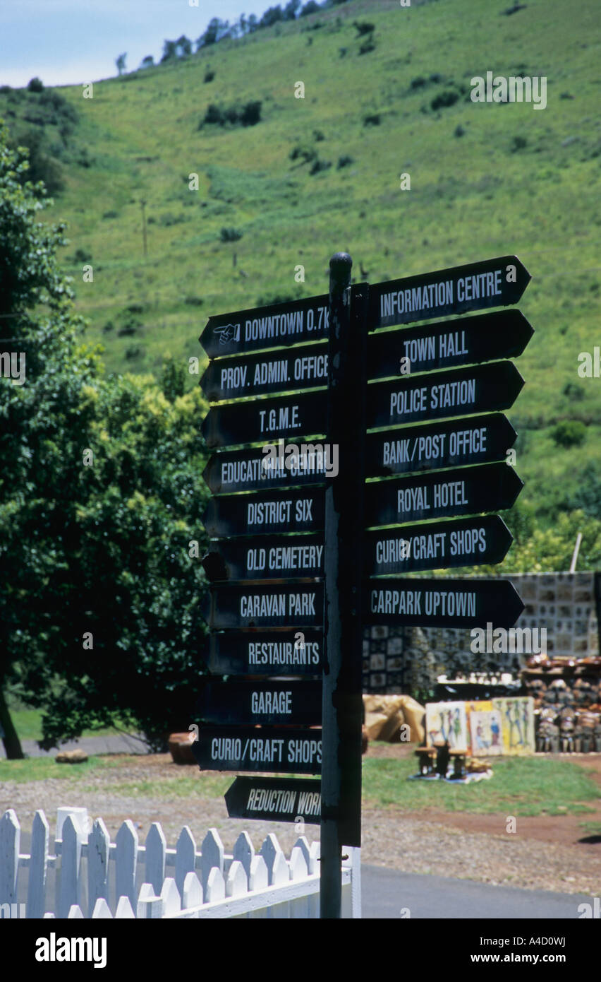 Arrow signs pointing to landmarks, tourist information, gold rush ...