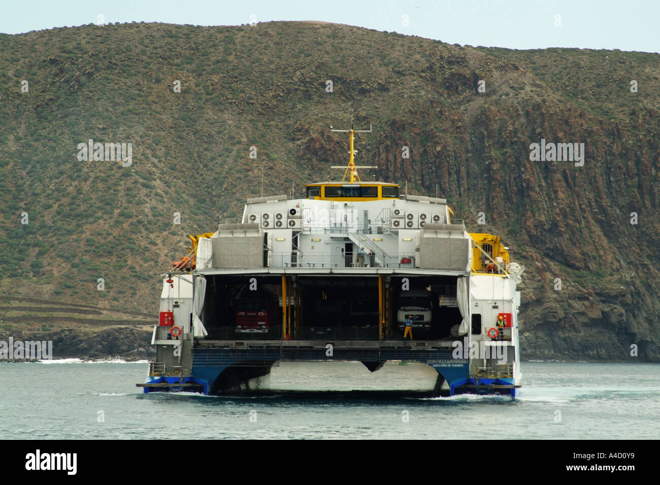 Benchijigua Express a roll on roll off fast ferry approaching the quay ...
