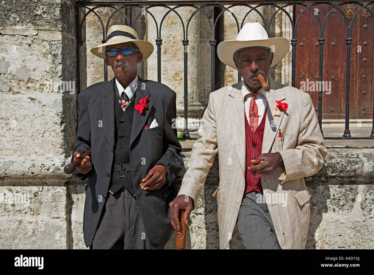Two men smoking cigars, Plaza de la Catedral, Havana, La Habana Vieja ...