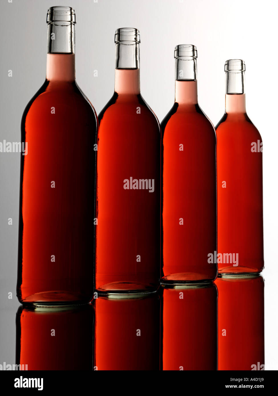 FOUR RED WINE BOTTLES Stock Photo - Alamy