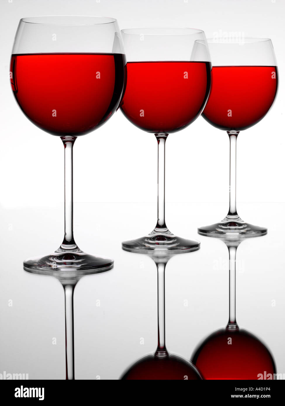 THREE RED WINE GLASSES Stock Photo - Alamy