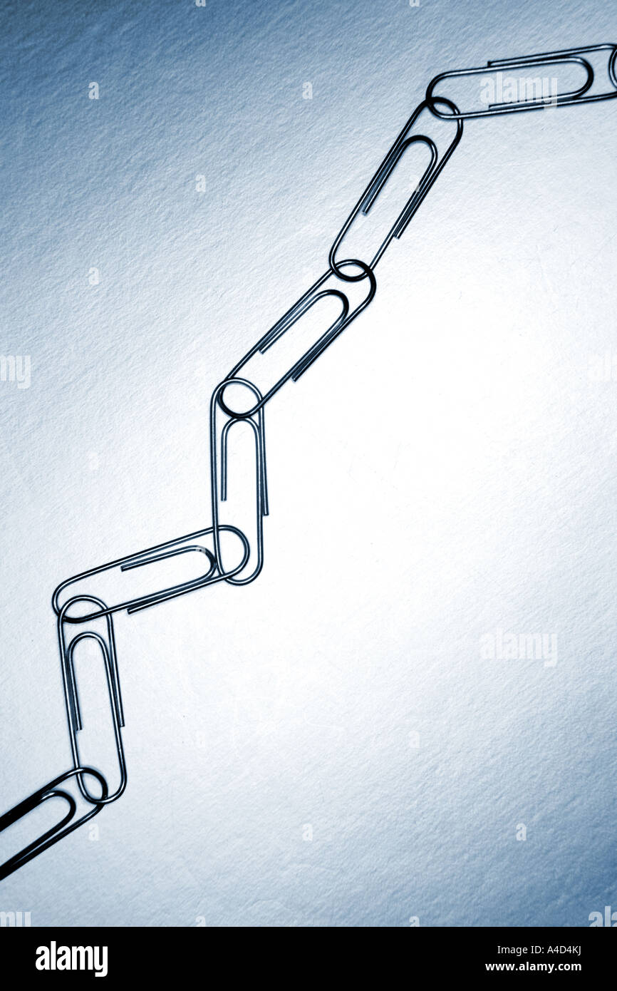 Joined paperclips hi-res stock photography and images - Alamy