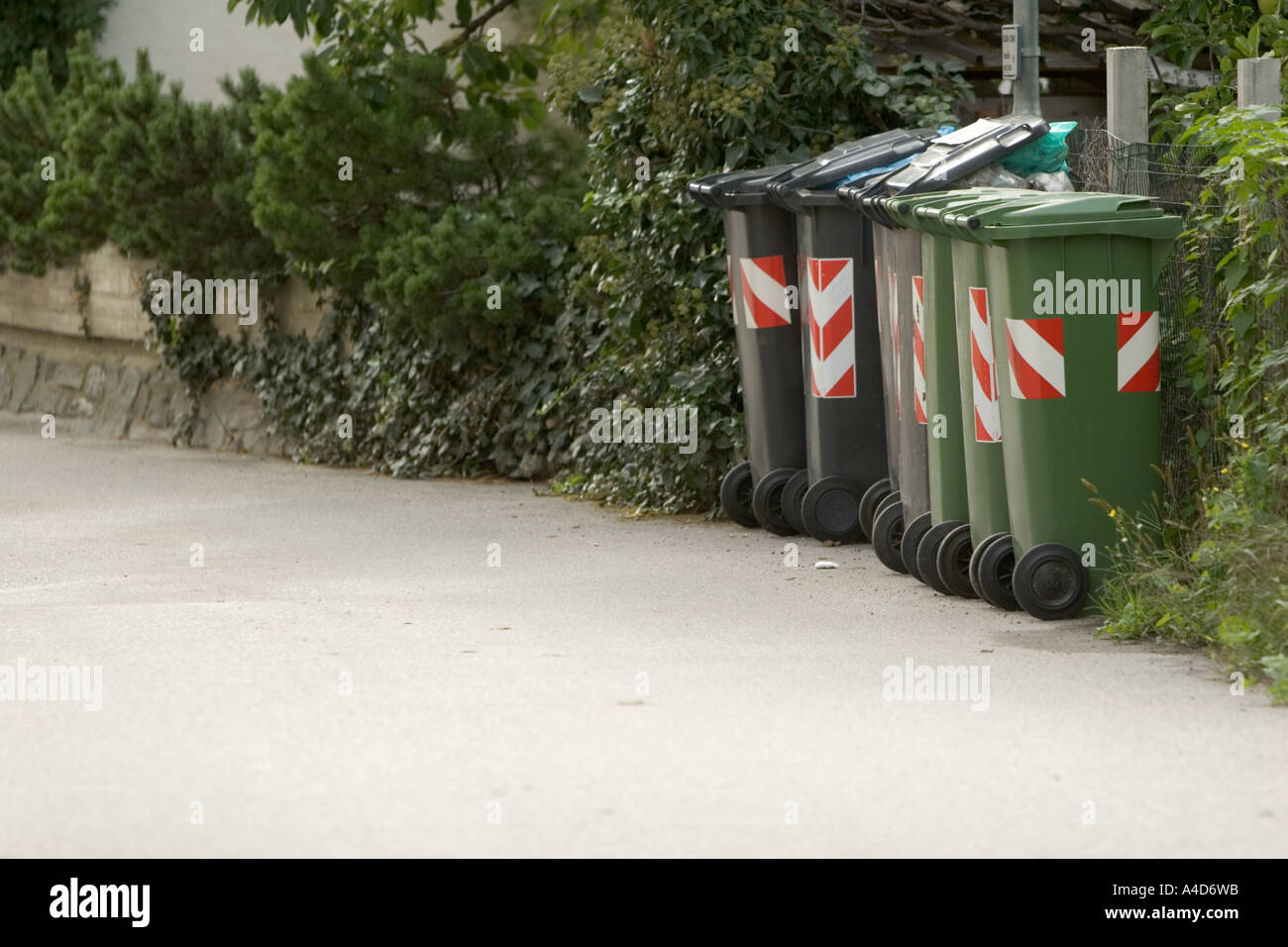 Italian rubbish bins on the street for collection Stock Photo - Alamy