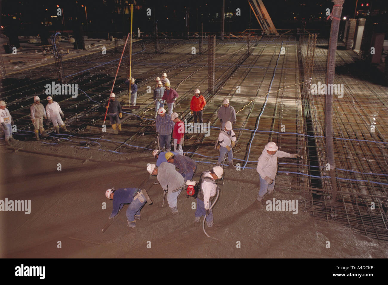 Worker carrying rebar hi-res stock photography and images - Alamy