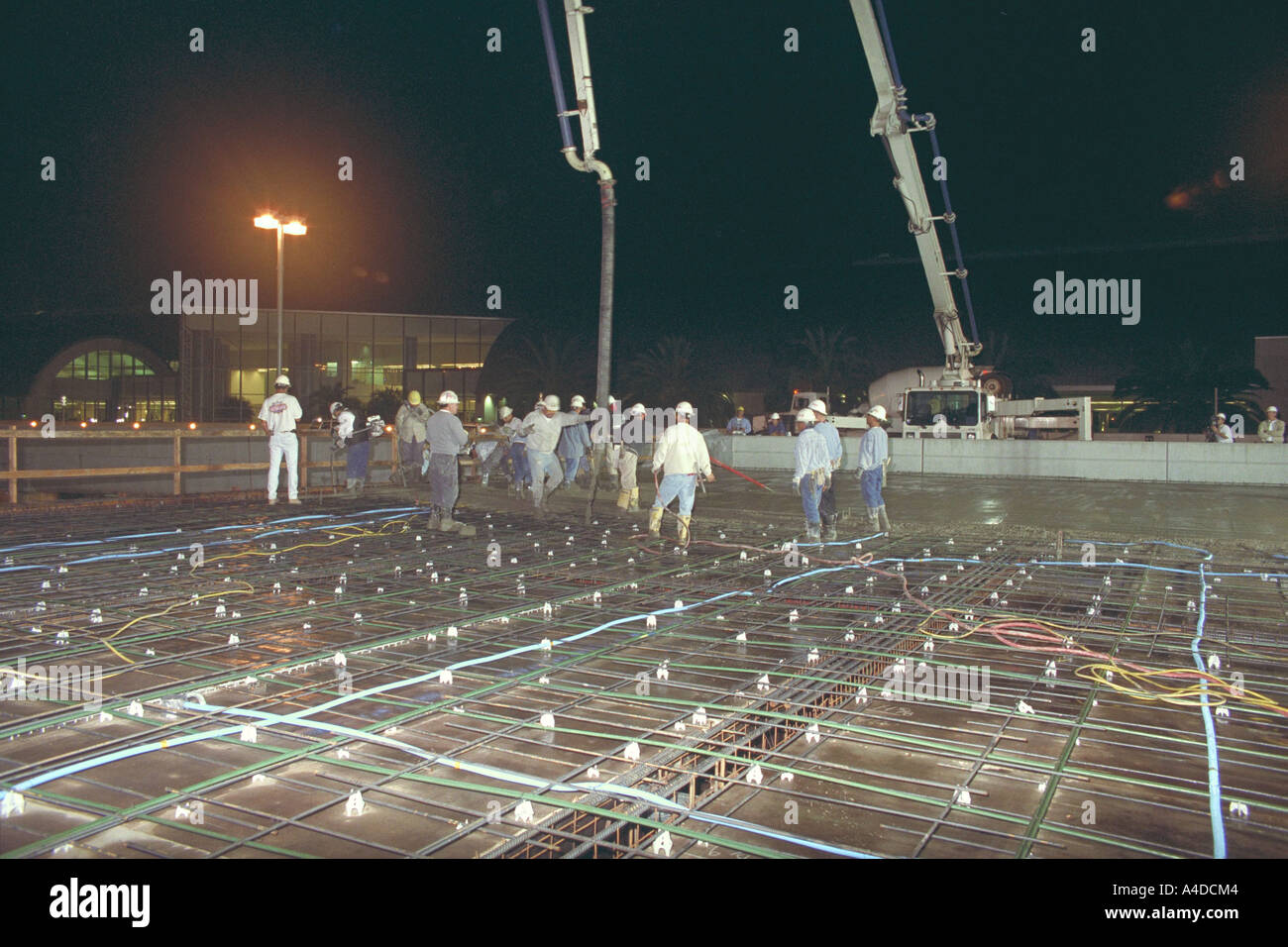 Worker carrying rebar hi-res stock photography and images - Alamy