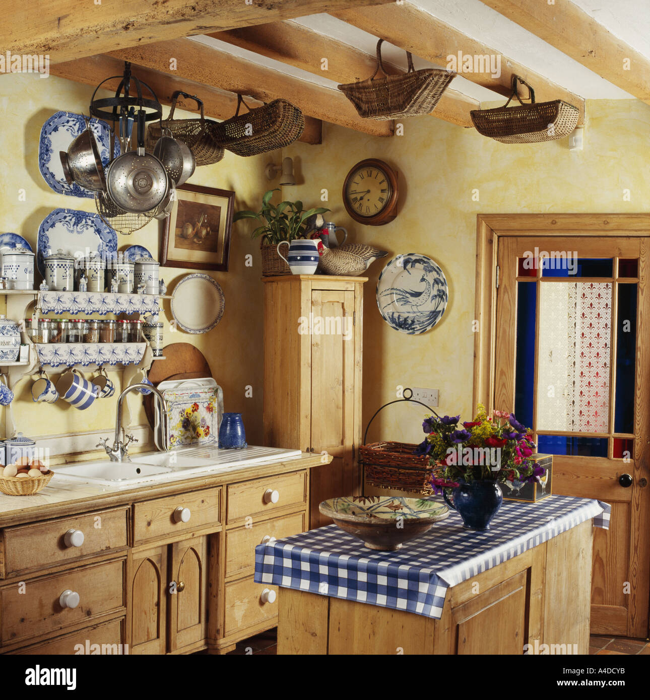 Country Cottage Beamed Kitchen with Island Stock Photo - Alamy