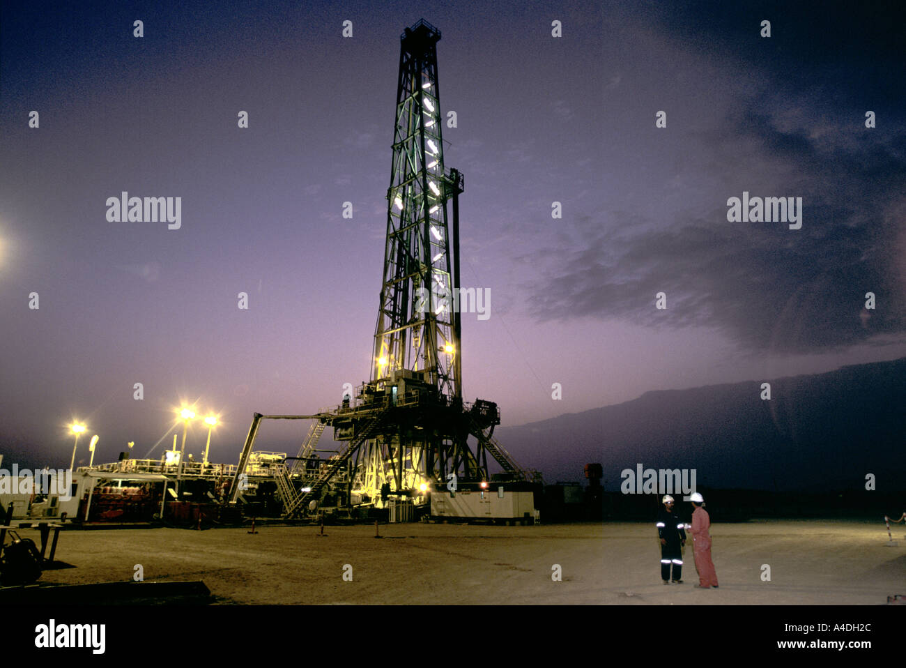 A drilling rig at dusk, Dumber oil fields, Sindh province, Southern ...