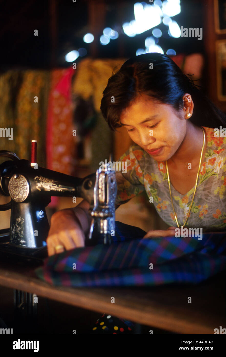 A seamstress working in a village in the Tenasserim region, Myanmar ...