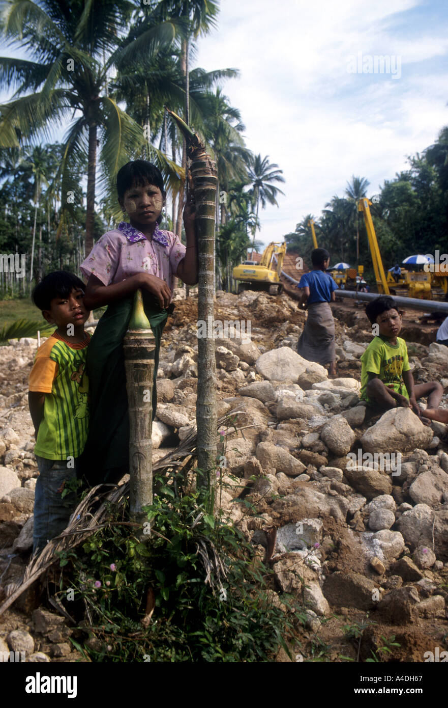 Children at the site of a gas pipeline construction through the jungle ...