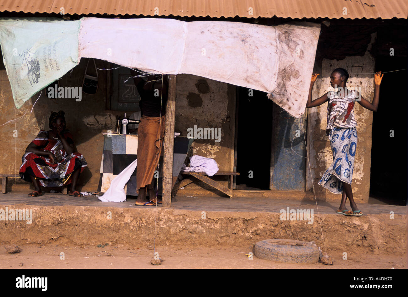 African village woman sewing hi-res stock photography and images - Alamy