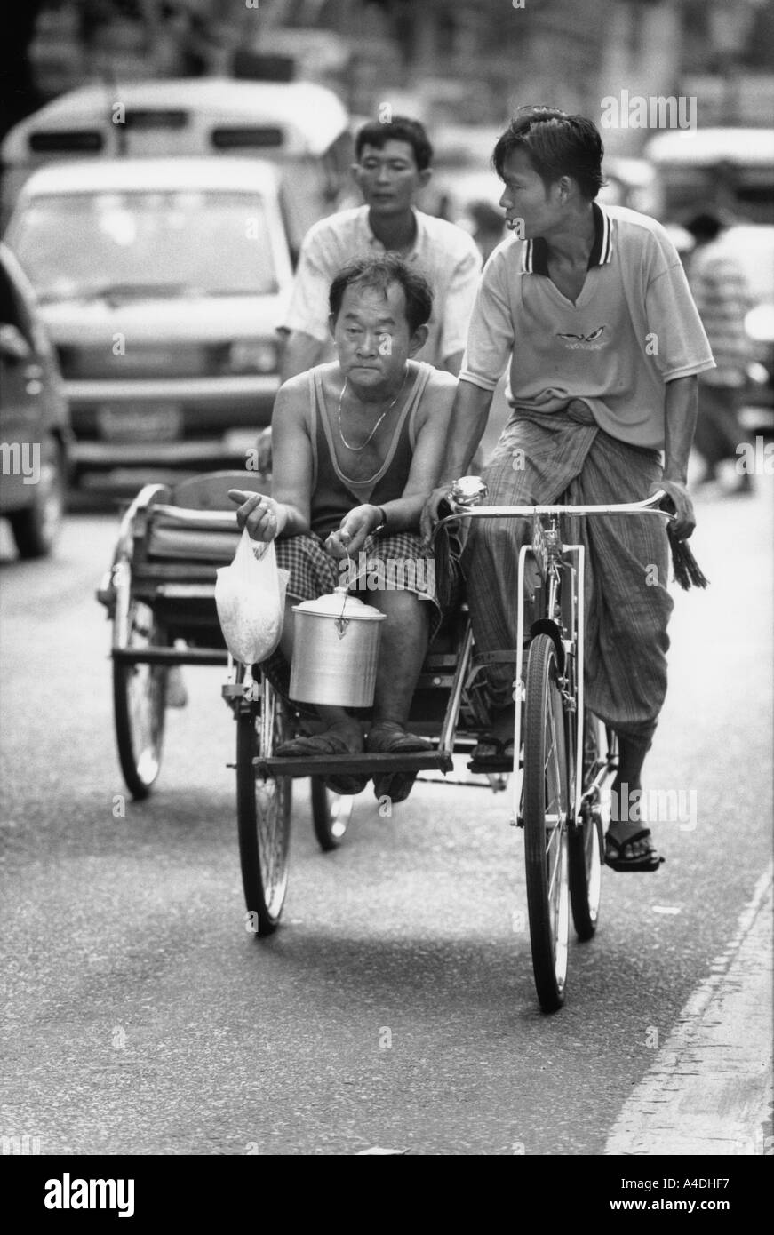 Man riding bicycle cycling Black and White Stock Photos & Images - Alamy
