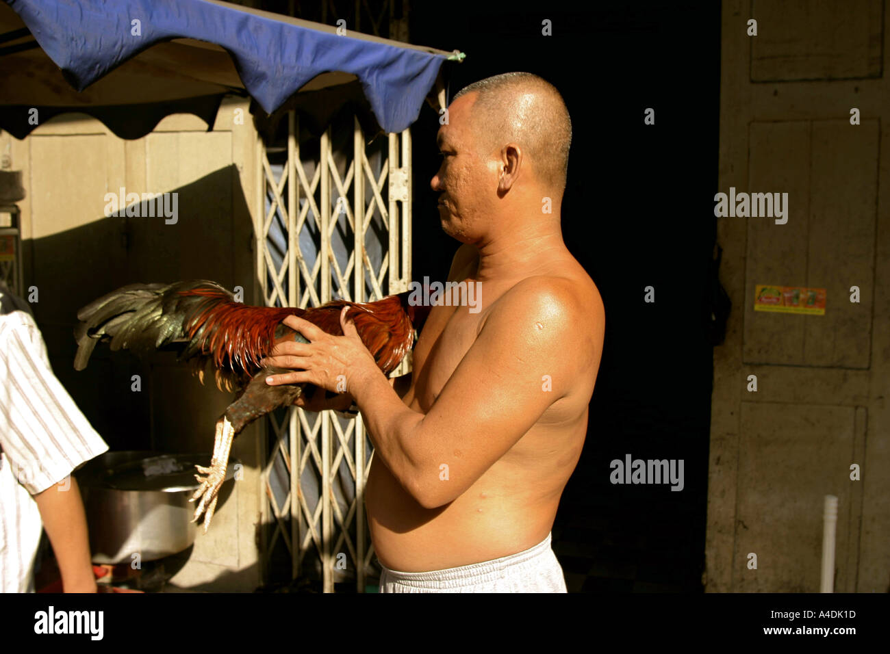 Man with a rooster hi-res stock photography and images - Alamy