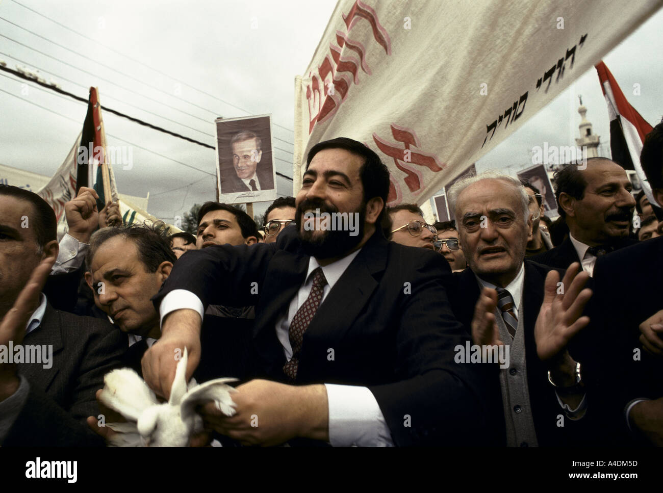 The chief rabbi Ibrahim Hamra liberating one of 60 doves in a pre ...