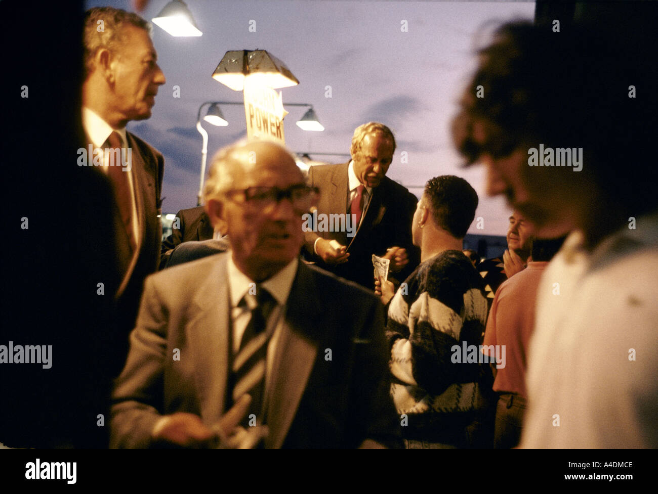 Punters place bets with bookmakers, greyhound racing, Walthamstow ...