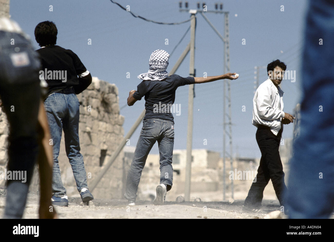 Throwing rocks at a Palestinian Intifada demonstration, Israel 1988 ...