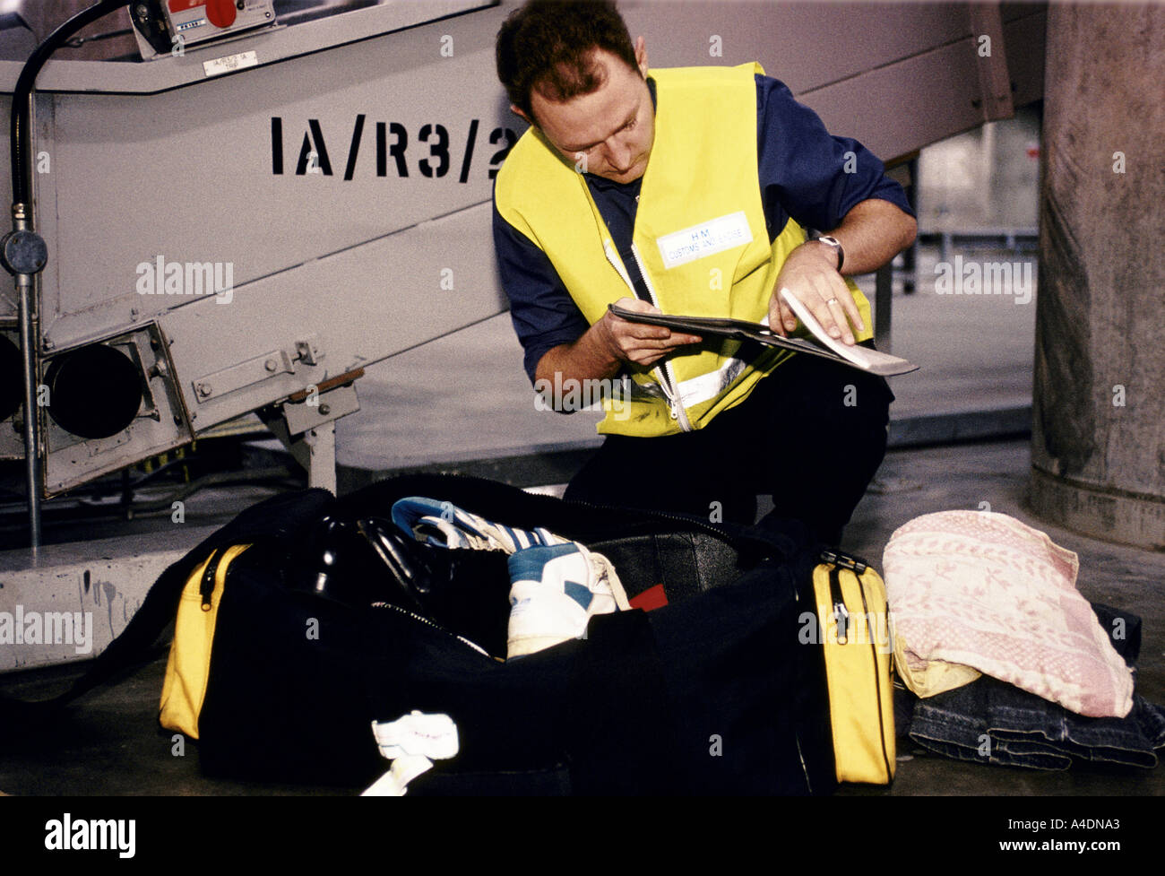 Customs Officer With Suitcase High Resolution Stock Photography and ...