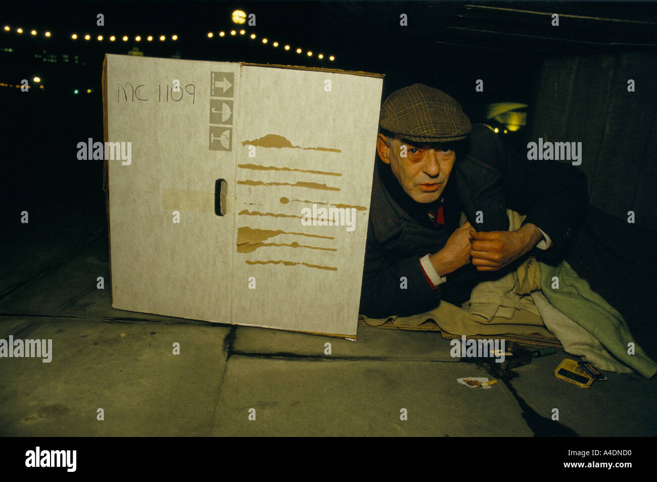 Black Homeless Man In A Box