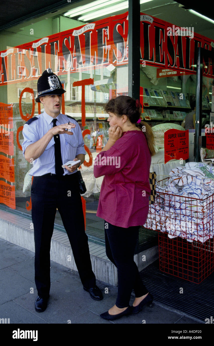 Police officer talking woman uk hi-res stock photography and images - Alamy
