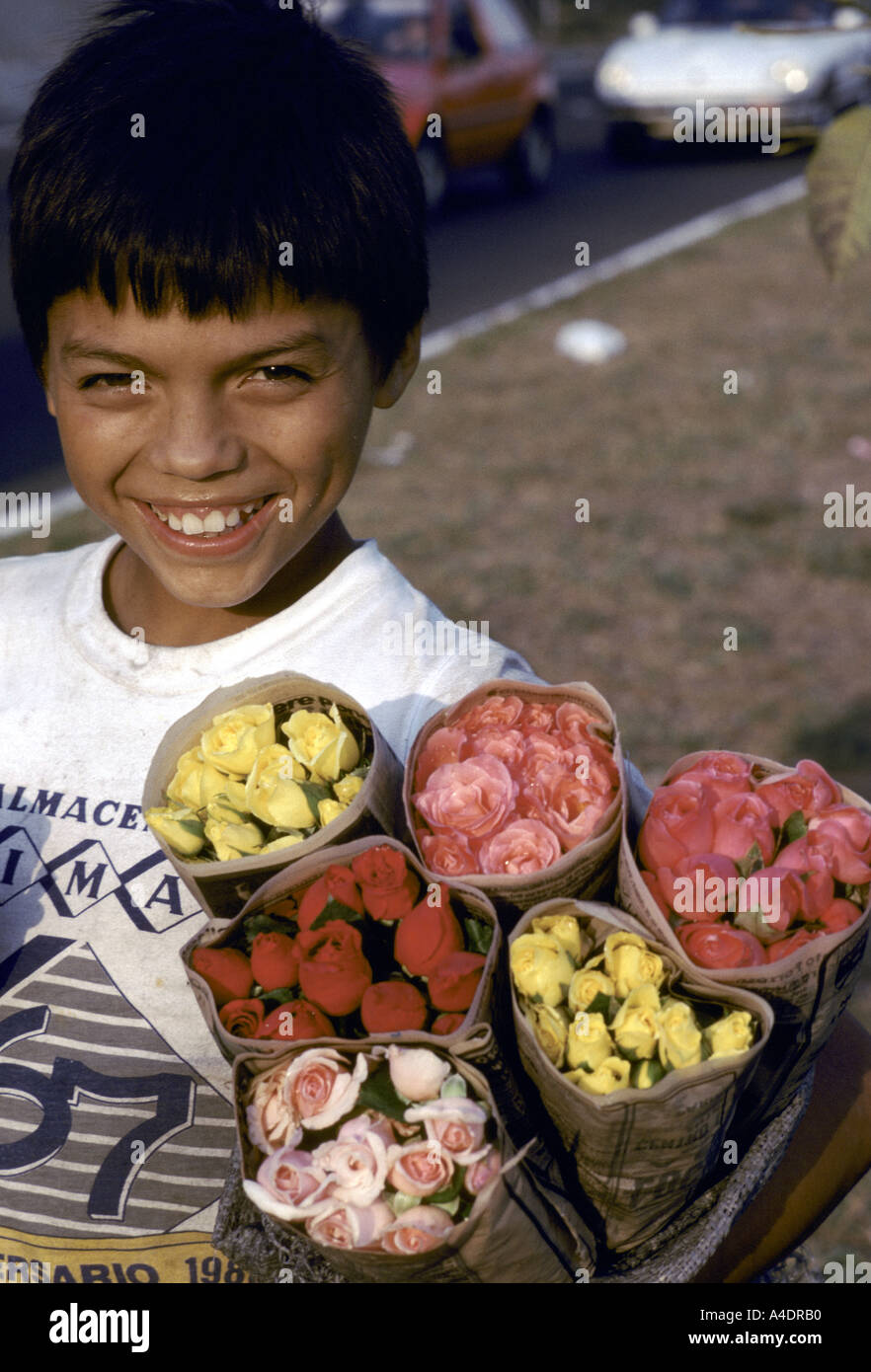 Child selling flowers hi-res stock photography and images - Alamy