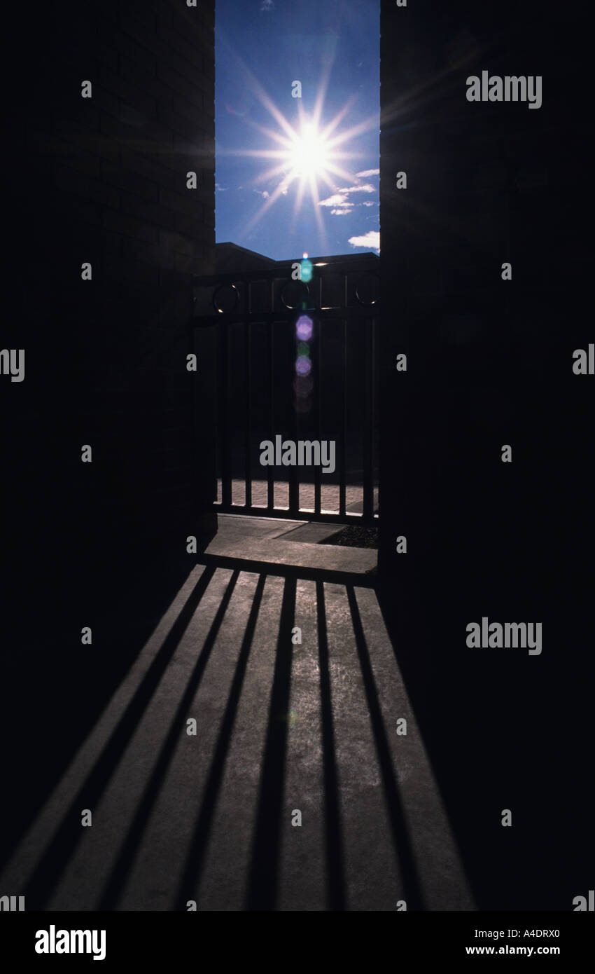 Sun and fence shadow Stock Photo - Alamy