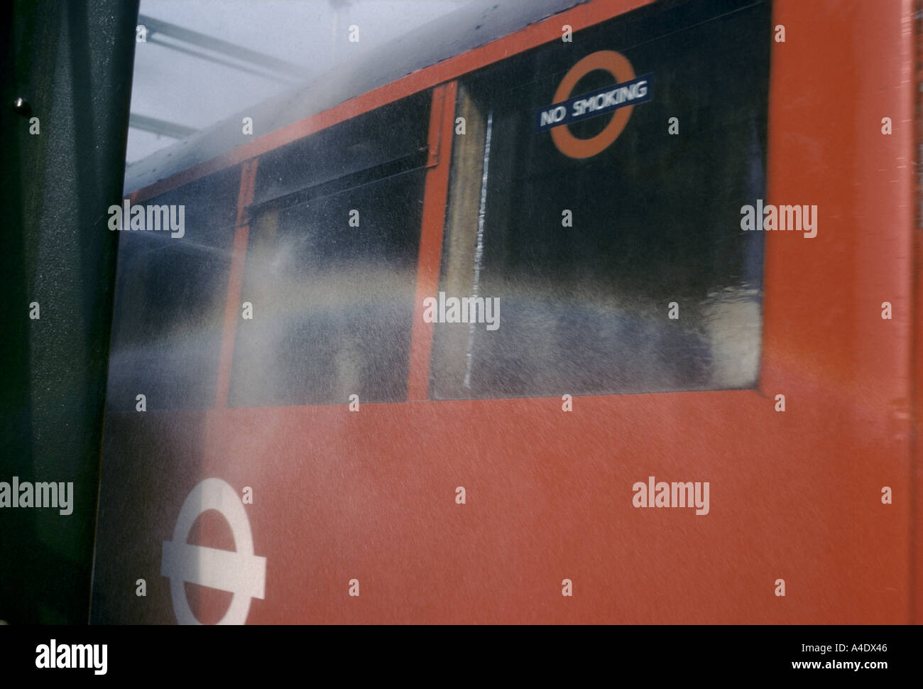 side of a london tube carriage going through a wash Stock Photo - Alamy