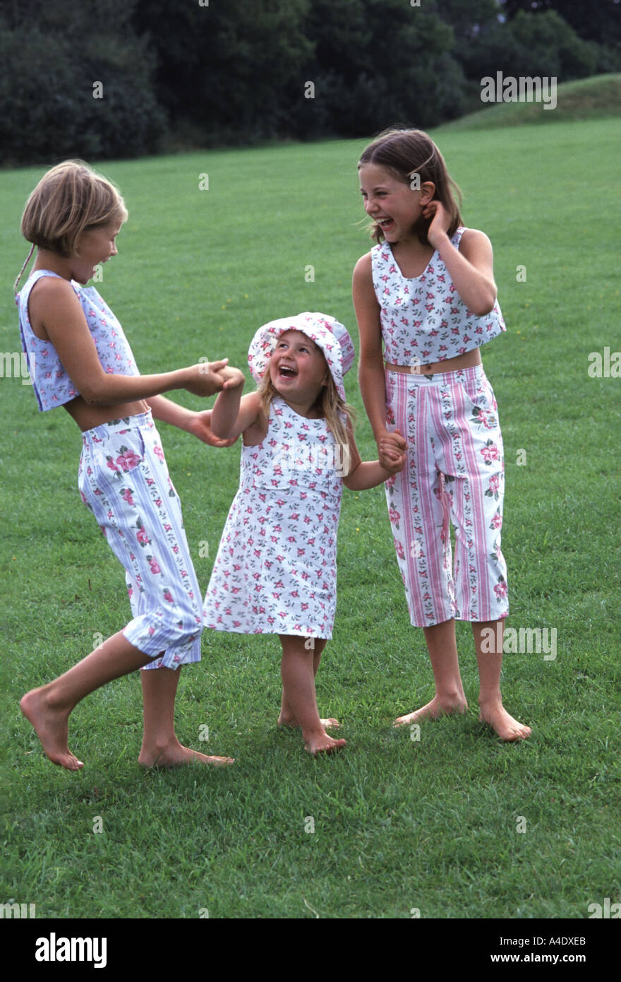 Group of girls laughing together Stock Photo - Alamy