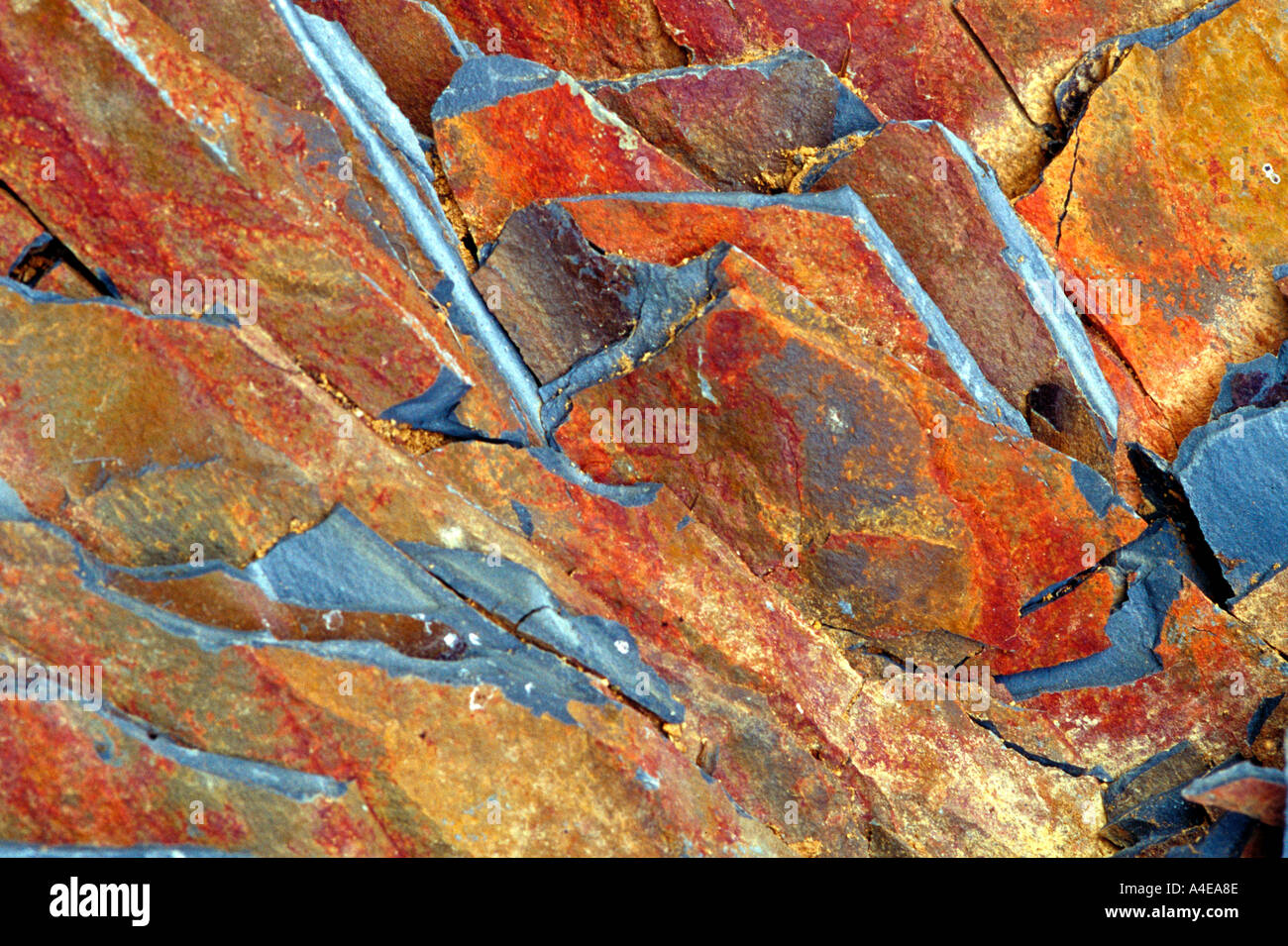 Mineral covered slate slag in Wales, UK Stock Photo - Alamy