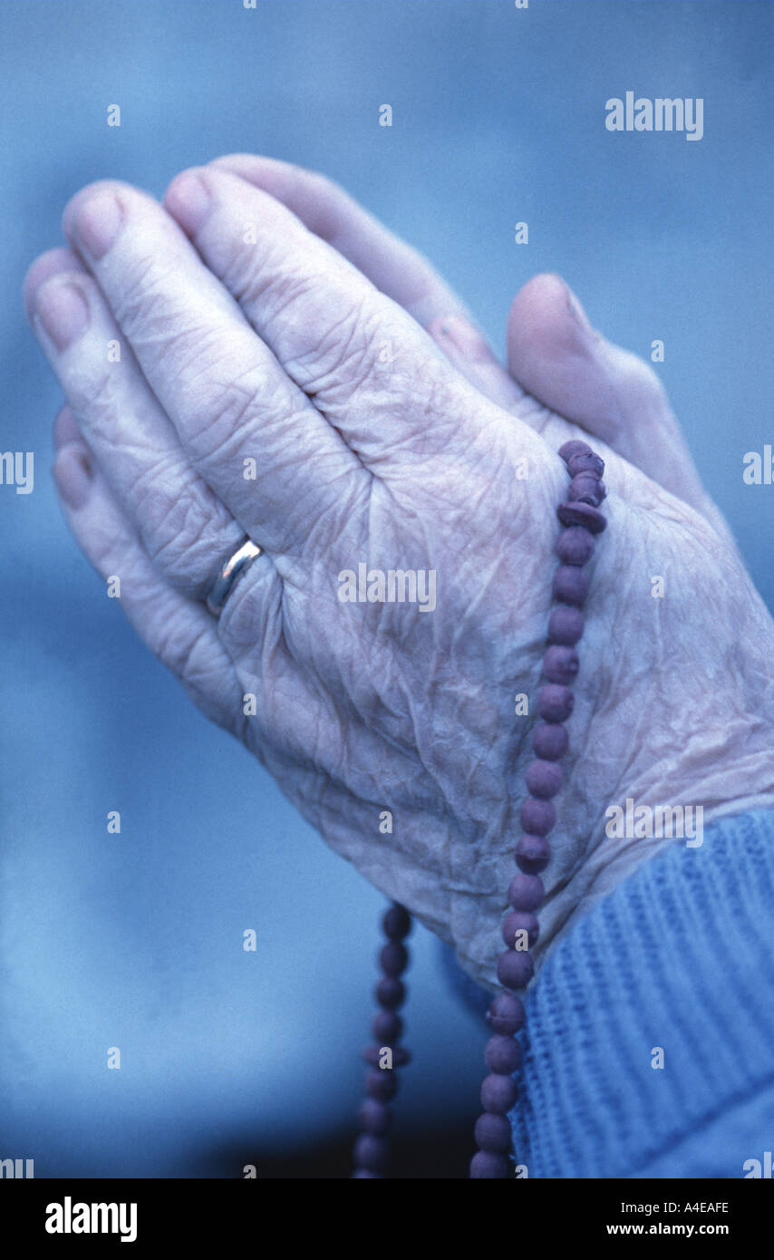 Elder praying hi-res stock photography and images - Alamy