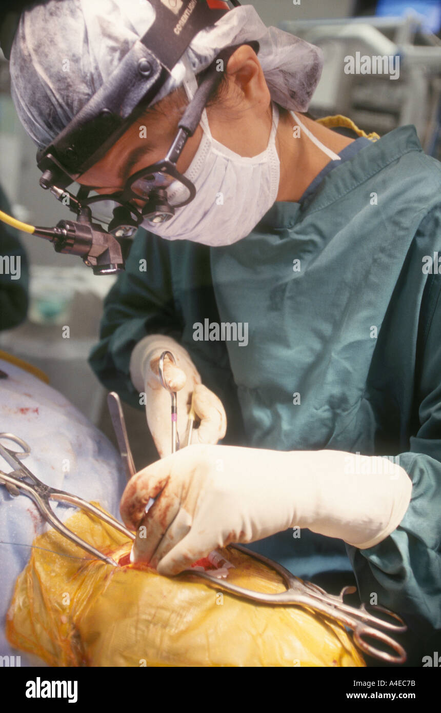 Doctor performing brain surgery Stock Photo - Alamy