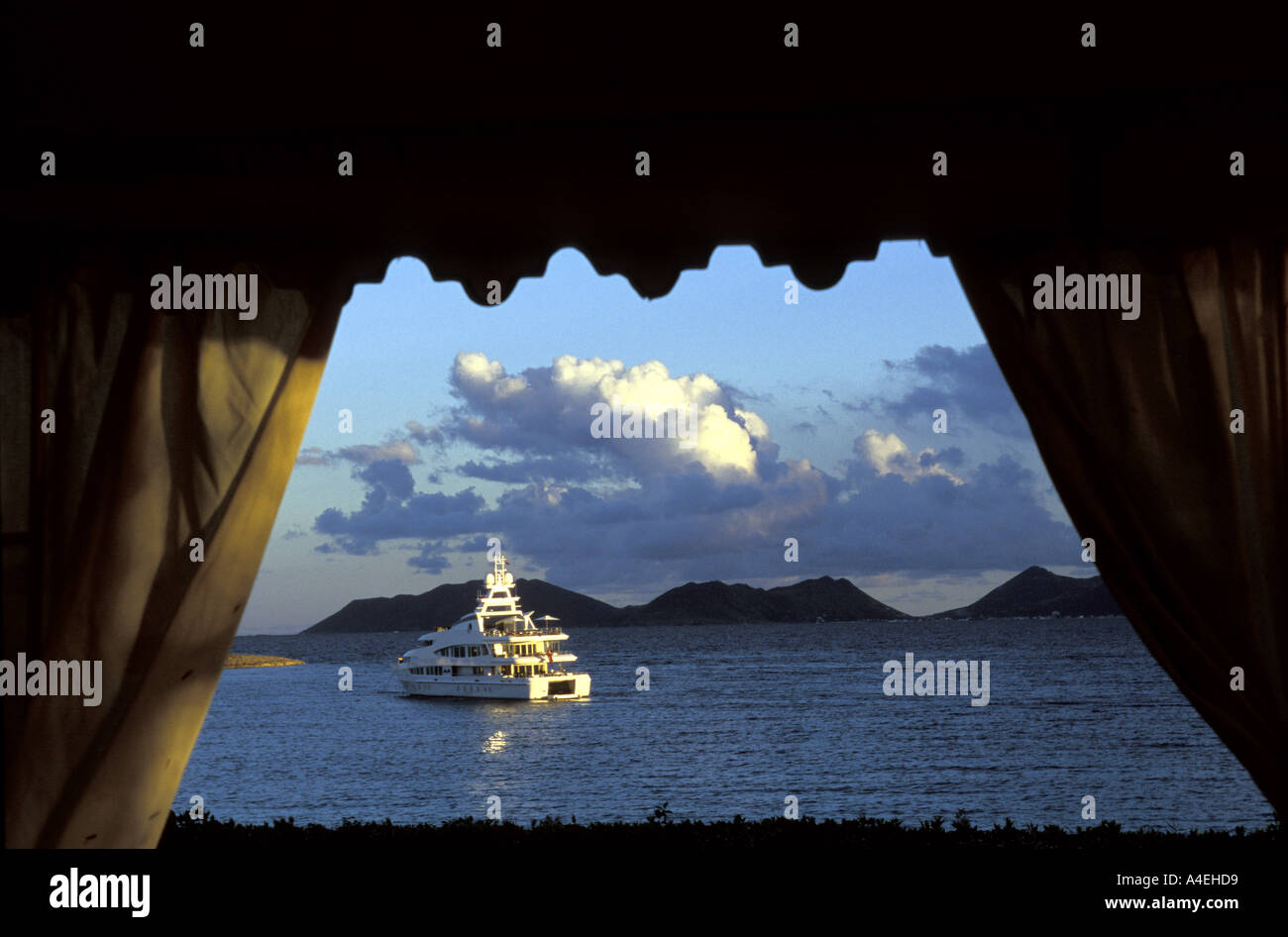 a luxury yacht moored next to the resort of cap jaluca on the caribbean ...