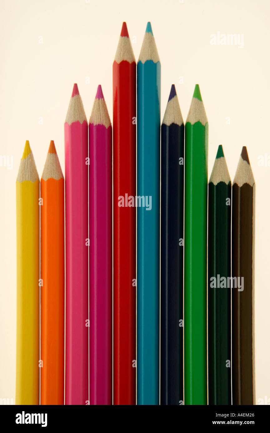 Ten coloured crayons in an arrow shape on a white background Stock ...