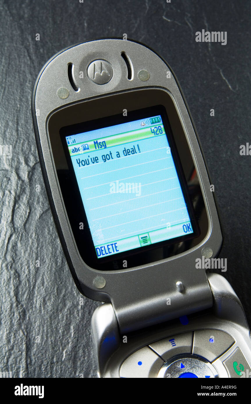 A mobile phone text message reading: You've got a deal ! Stock Photo ...