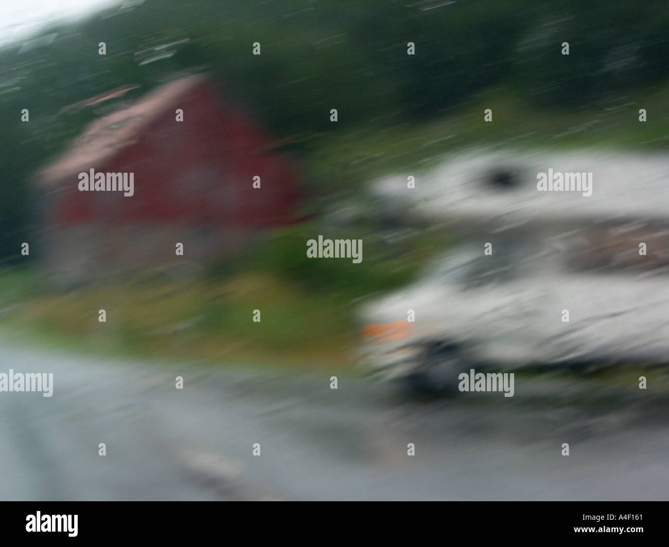 Camper van and barn in bad weather Stock Photo - Alamy