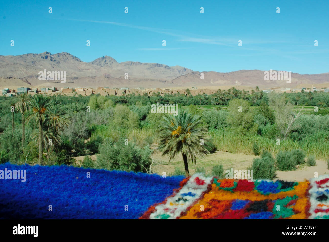 Moroccan landscape with carpet in foreground Stock Photo - Alamy