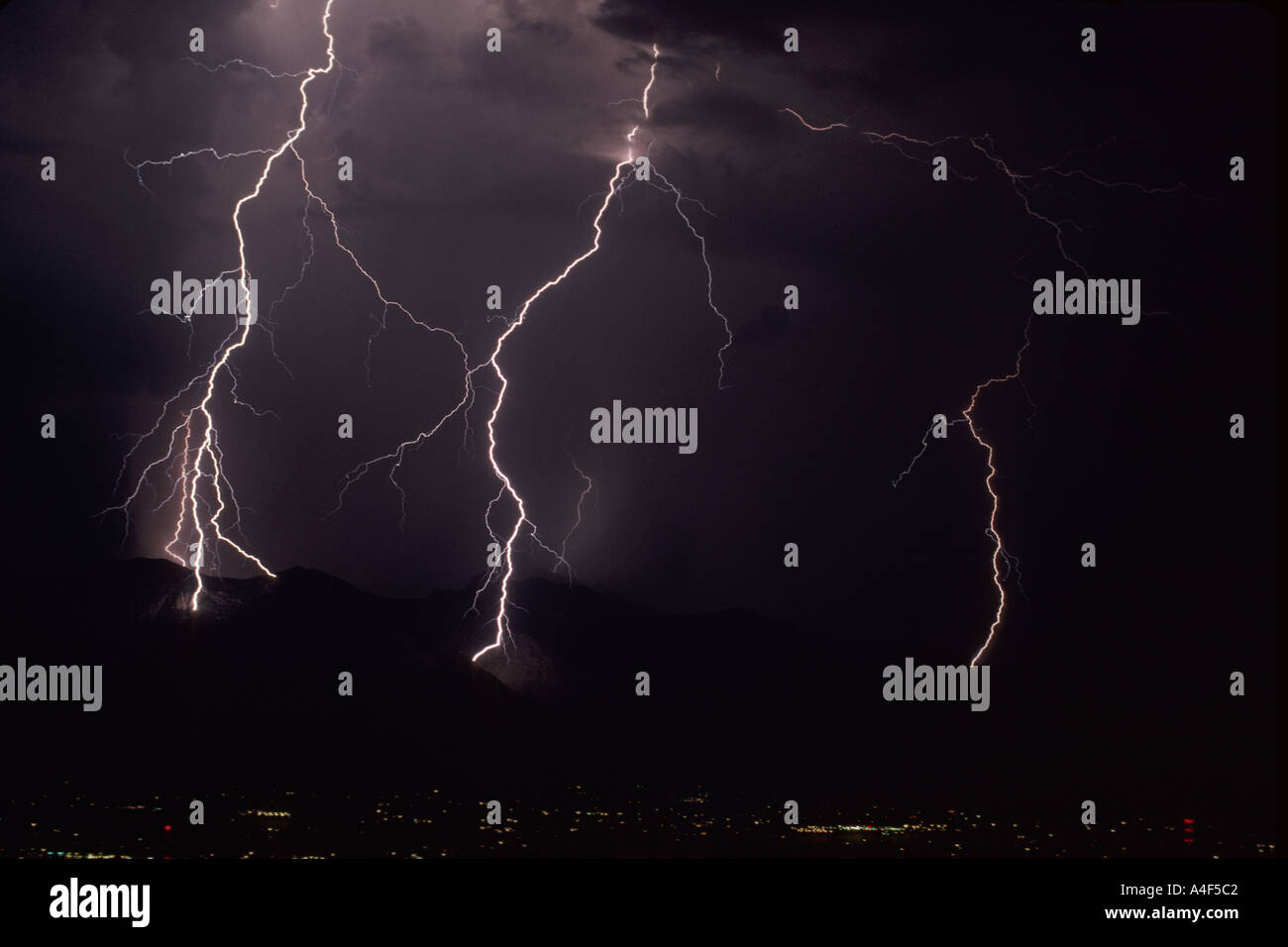 Lightning strikes in the mountains Stock Photo - Alamy