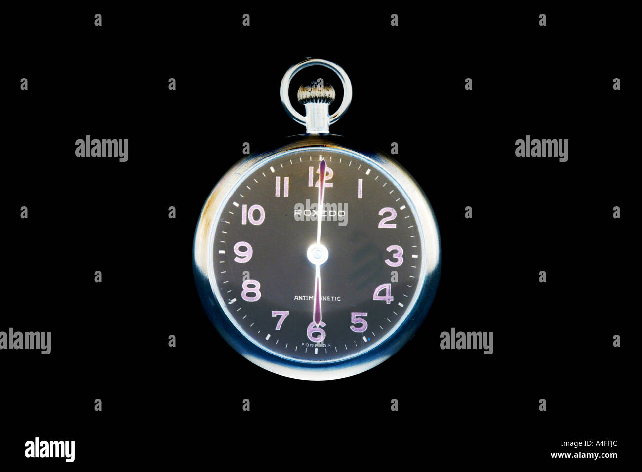 Pocketwatch at 6 o'clock against a black background Stock Photo - Alamy