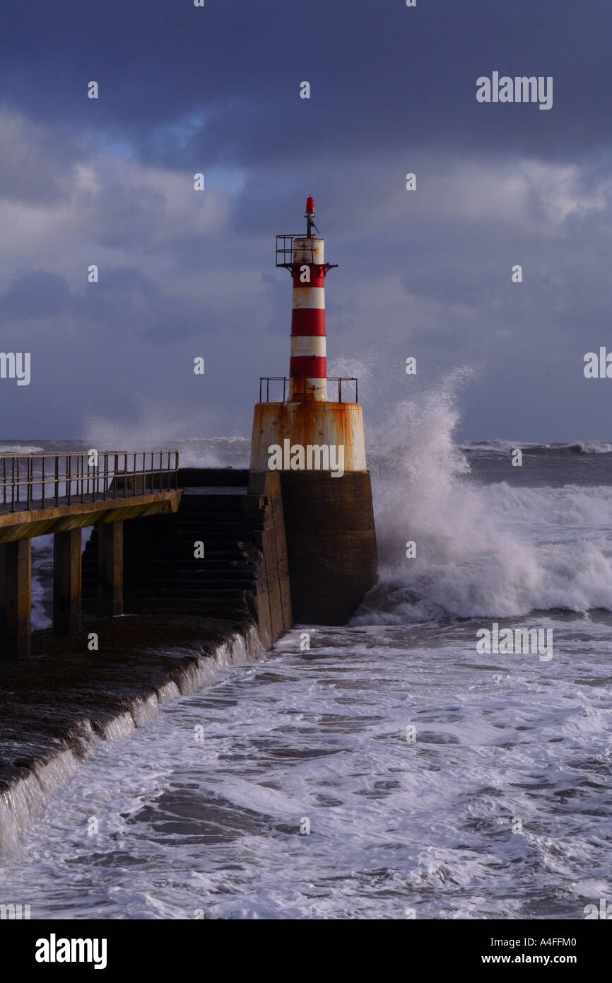 Lighthouse amble pier lighthouse hi-res stock photography and images ...