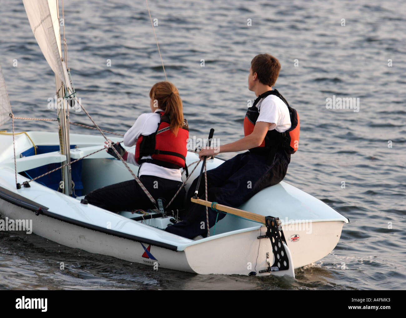 Young people learn sailing Stock Photo - Alamy