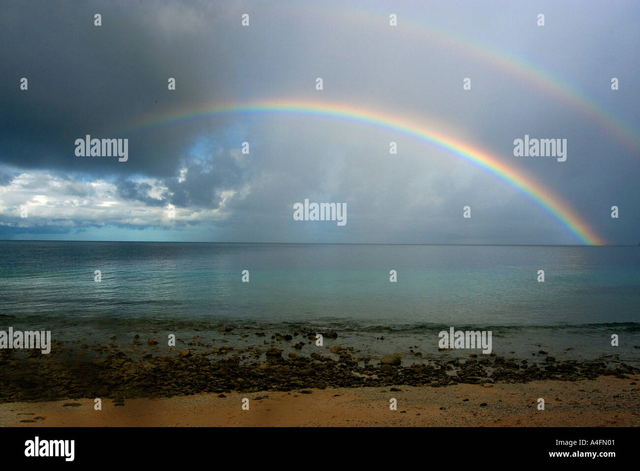 Double rainbow and rainstorm Namu atoll Marshall Islands N Pacific ...