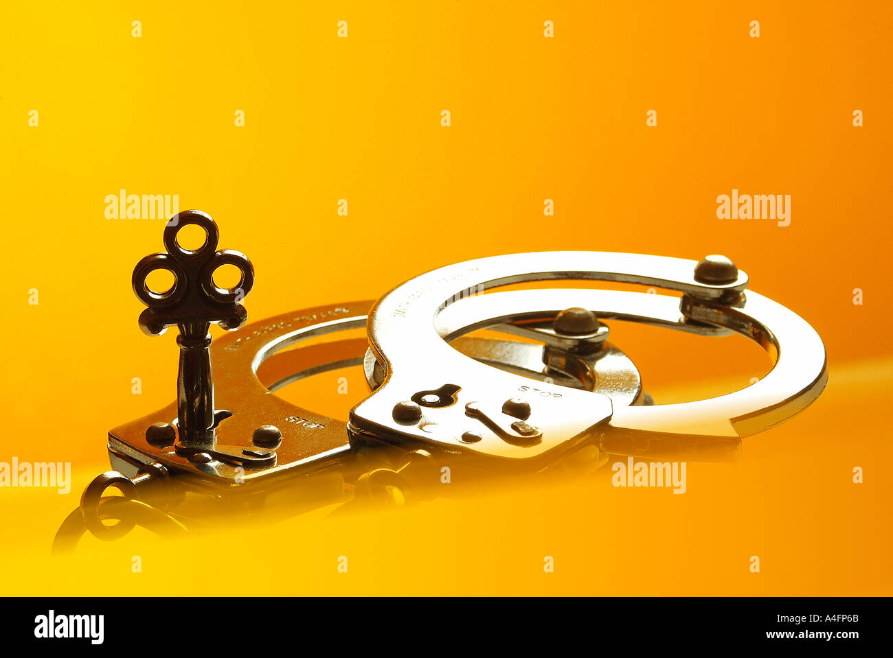 Handcuffs hi-res stock photography and images - Alamy