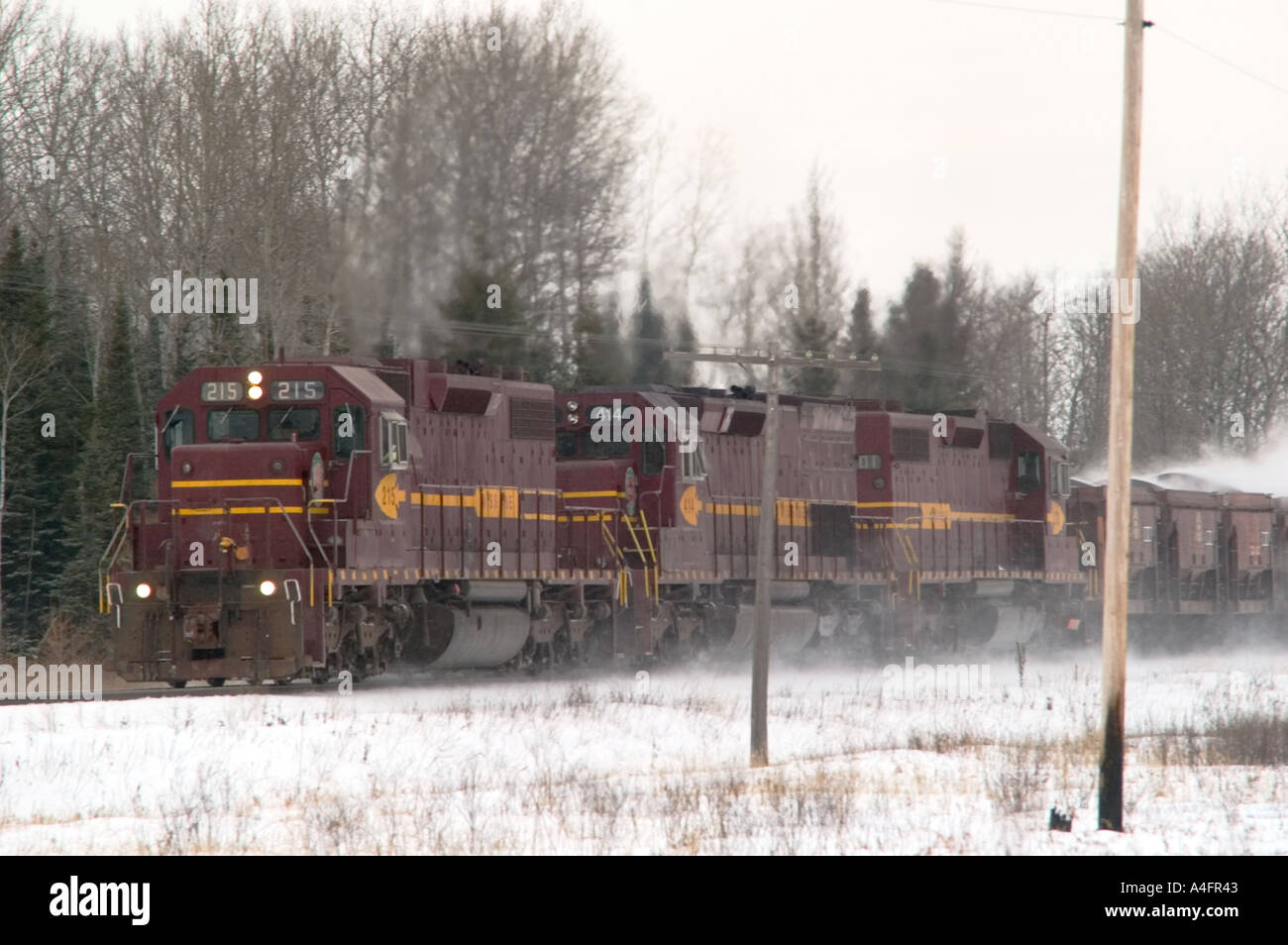 Train hauling taconite through iron range in northern Minnesota Stock ...