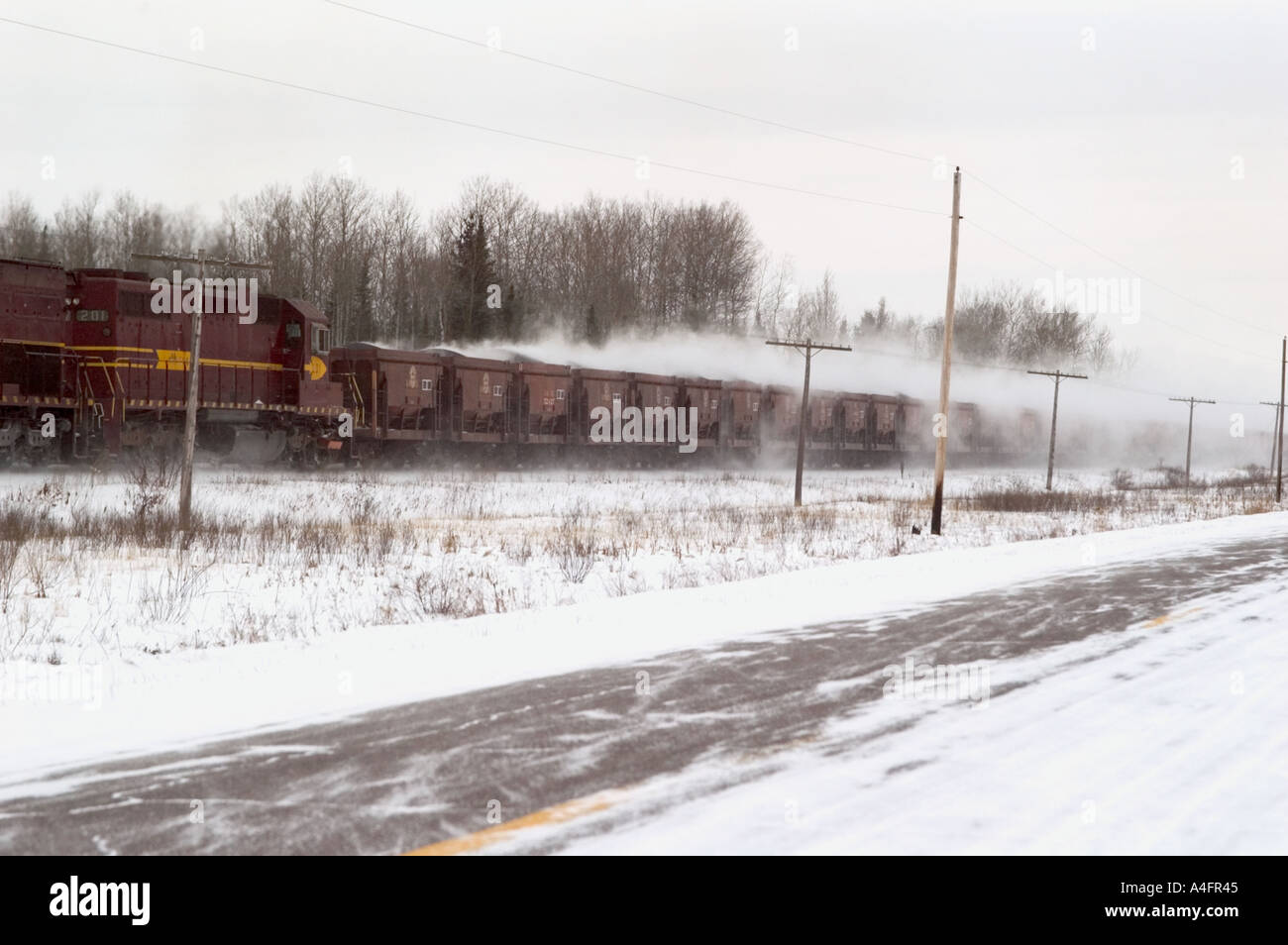 Train hauling taconite through iron range in northern Minnesota Stock ...