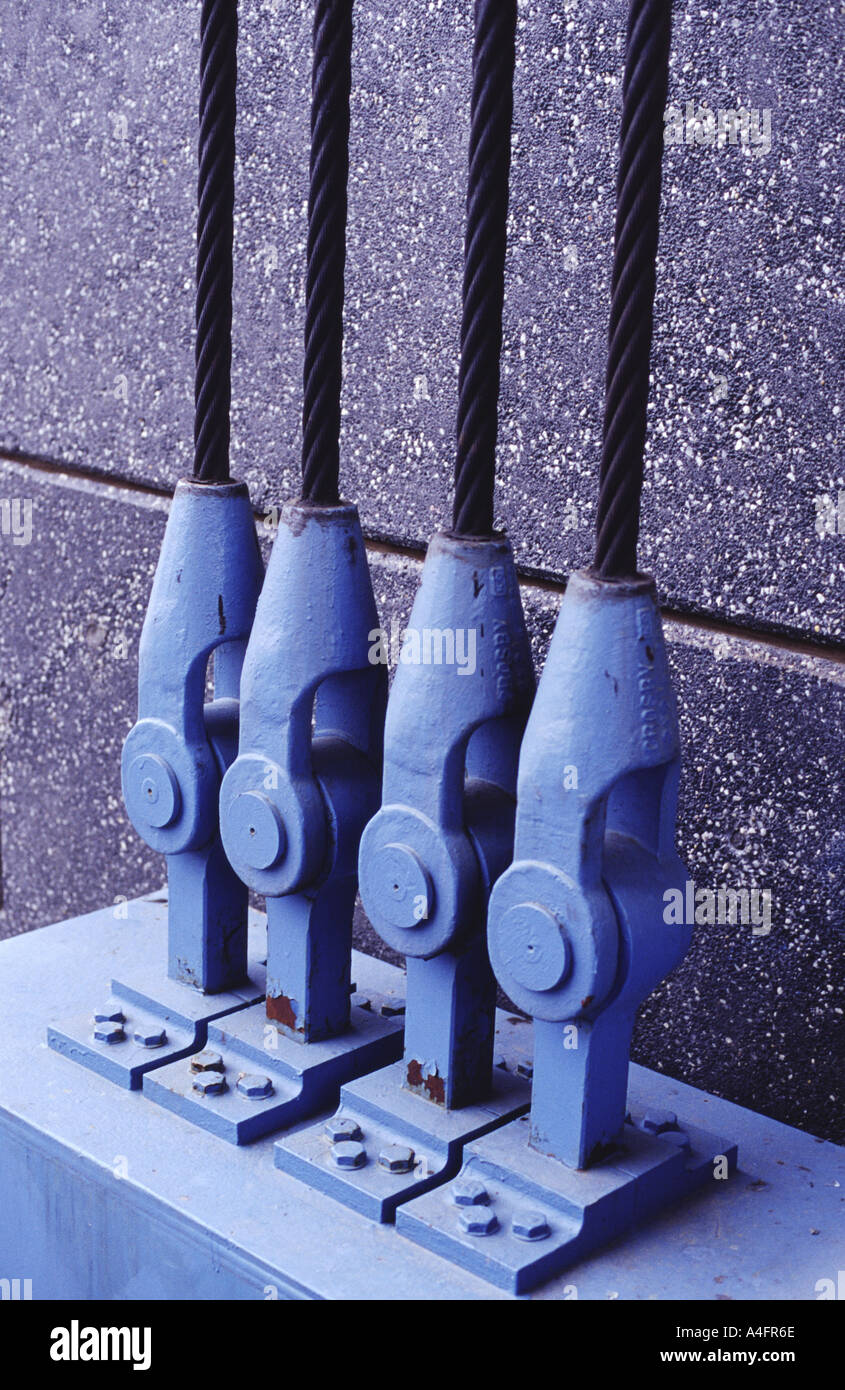 four cables attached to a heavy weight Stock Photo - Alamy