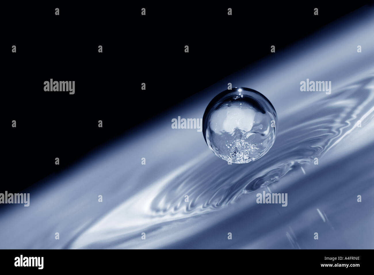 Suspended water droplet floating hi-res stock photography and images ...
