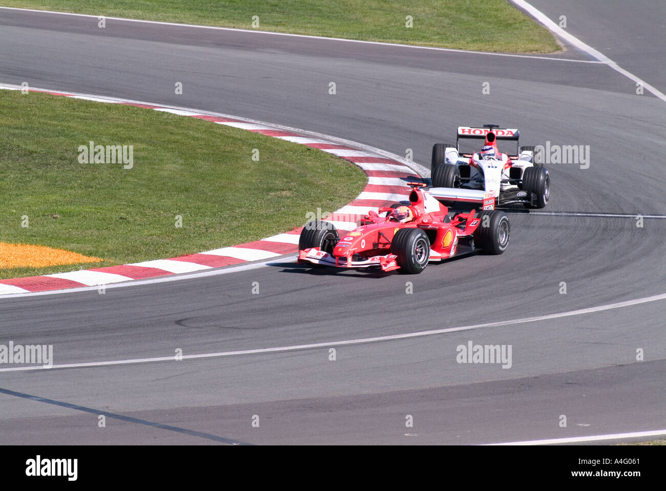 Two Formula 1 racing cars red white bodies in race at turn Gilles ...