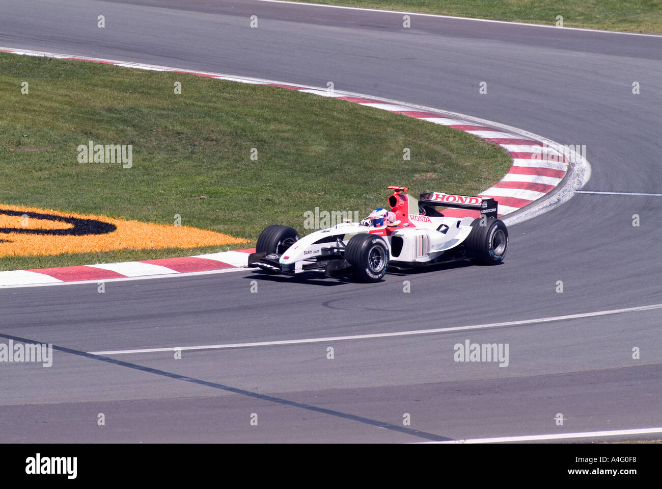 Formula 1 racing car red white Honda body in race at turn Gilles ...