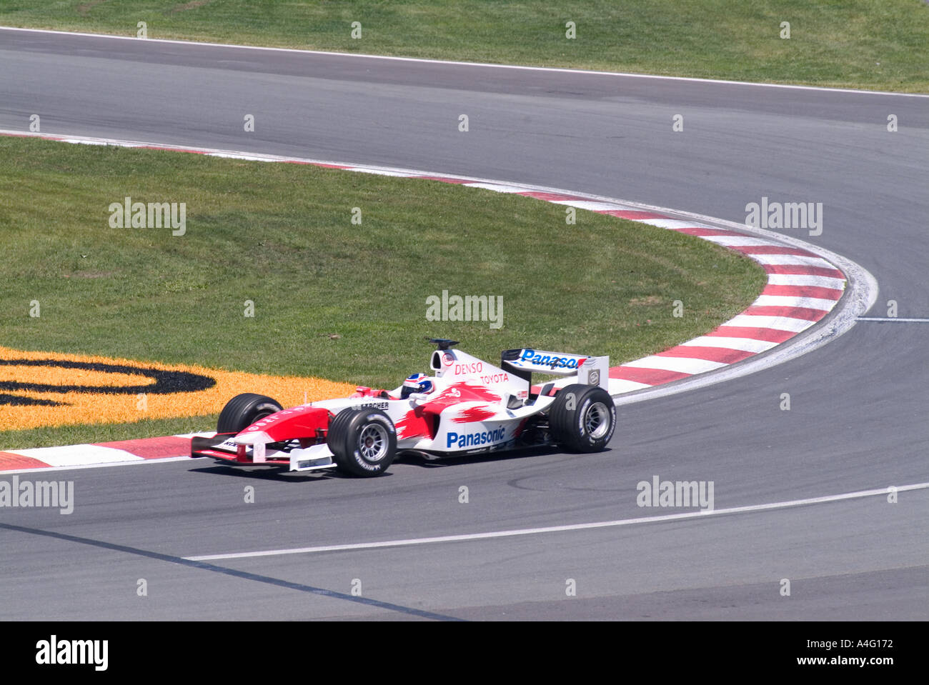 Formula 1 racing car white red body at turn in race Gilles Villeneuve ...