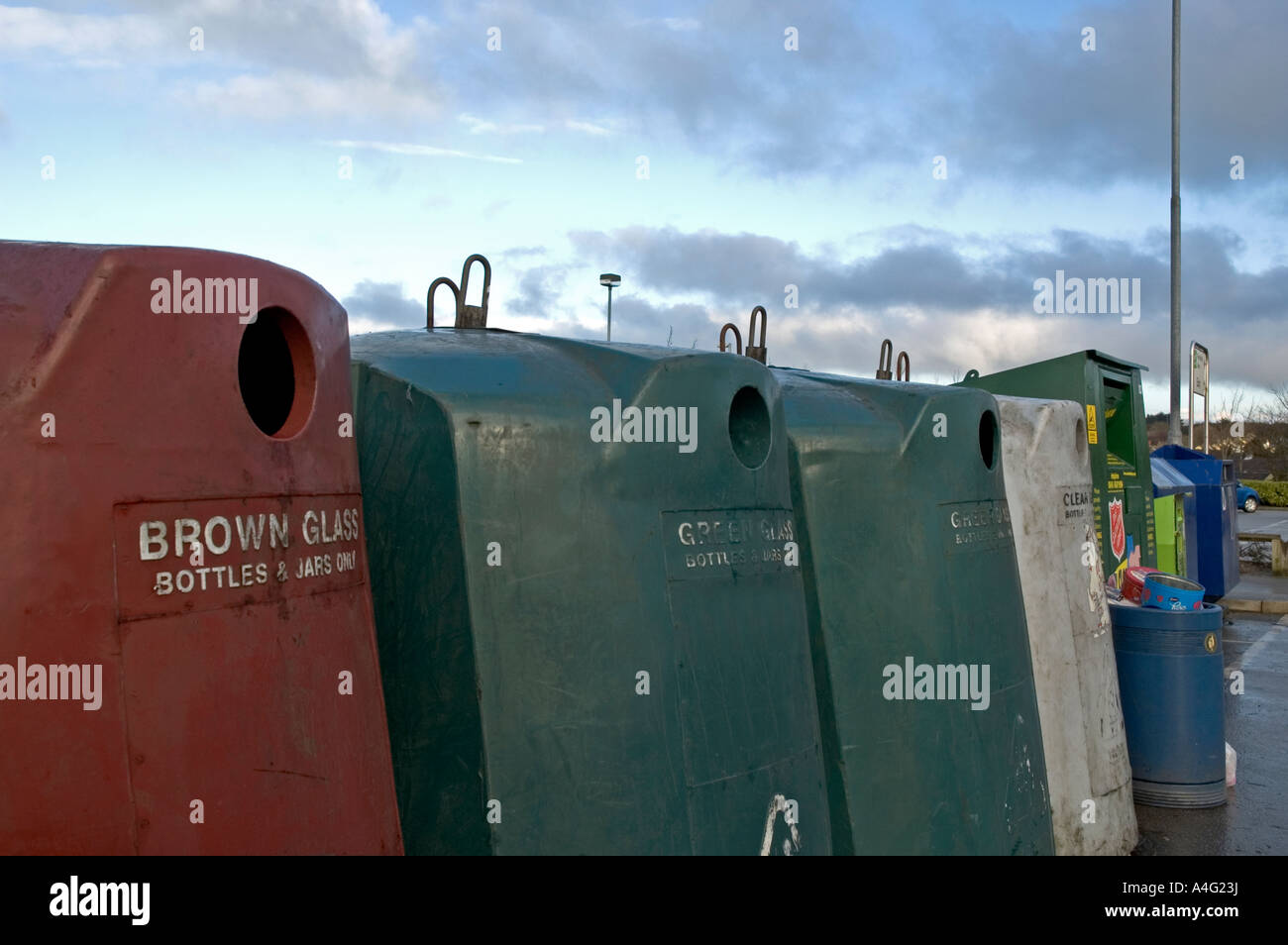 glass bottle recycling bins in a supermarket car park in cornwall,england Stock Photo - Alamy