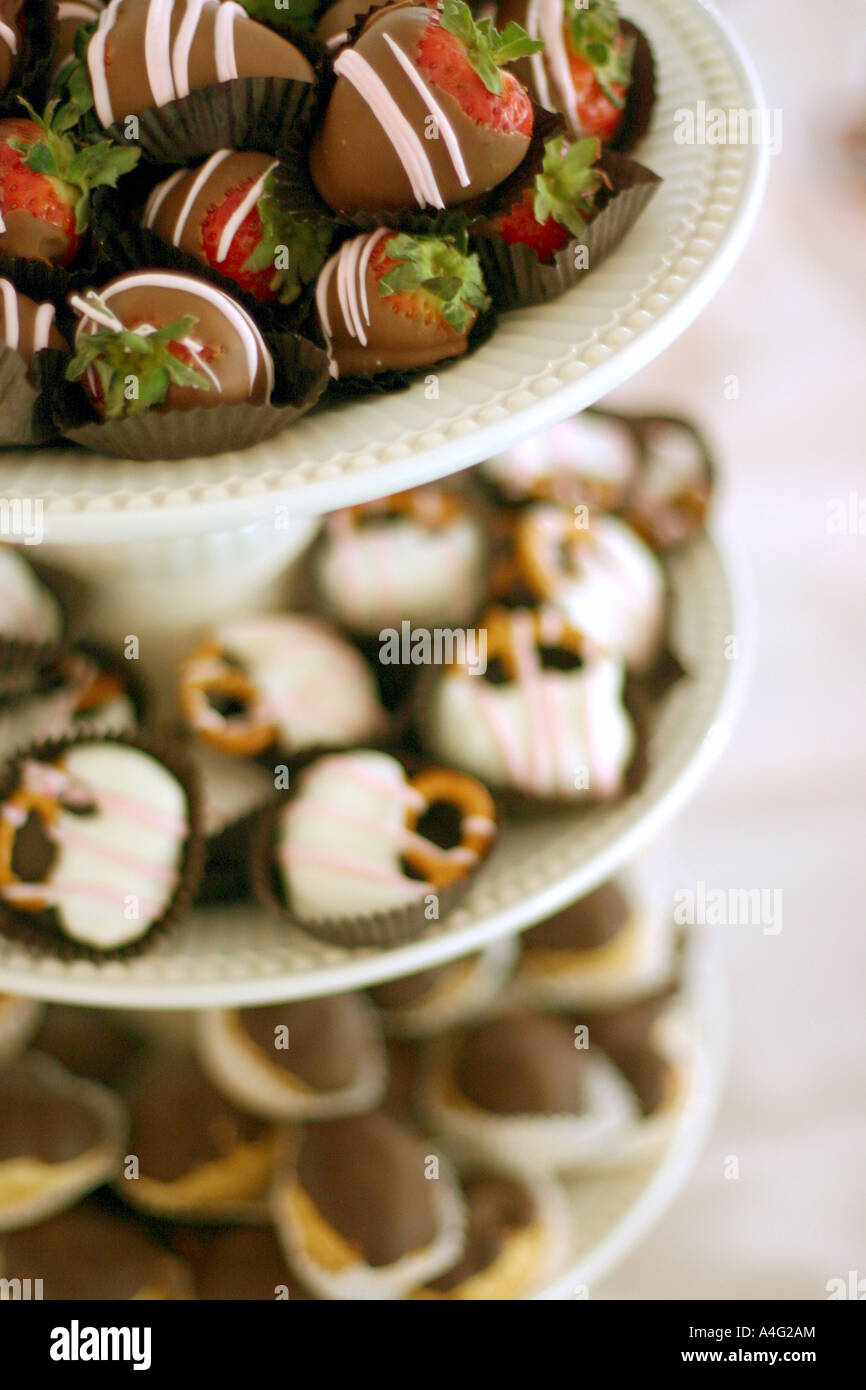 An assortment of finger foods for a wedding strawberries with chocolate ...
